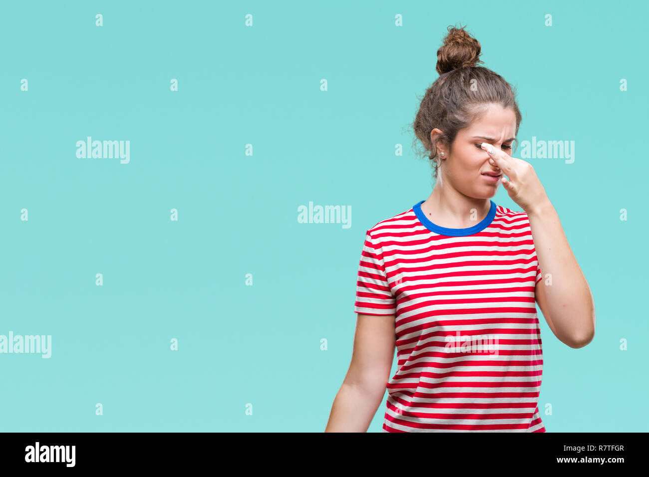 Beautiful brunette curly hair young girl wearing casual look over ...