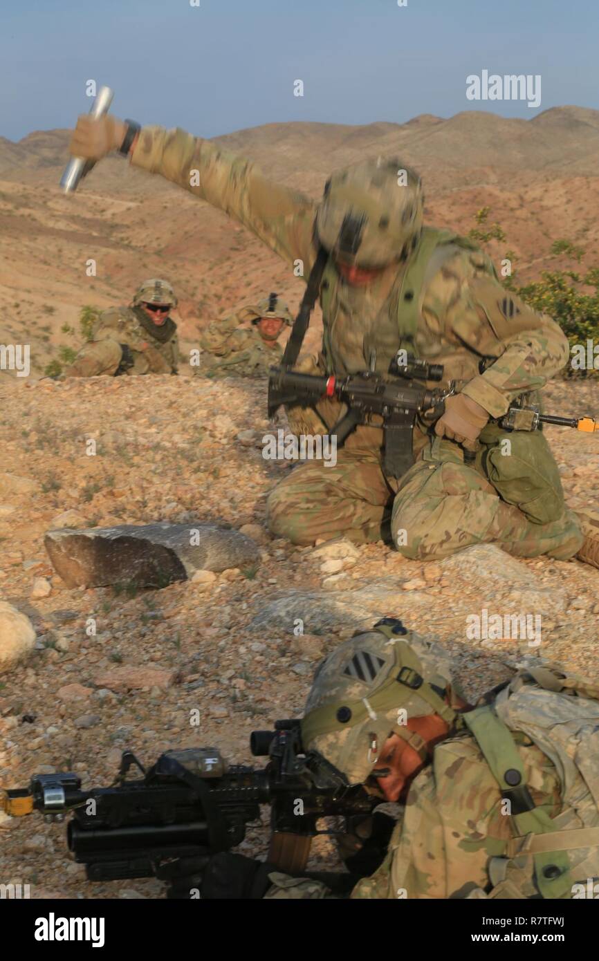 U.S. Army Soldiers of 1st Battalion, 30th Infantry Regiment, signal the ...