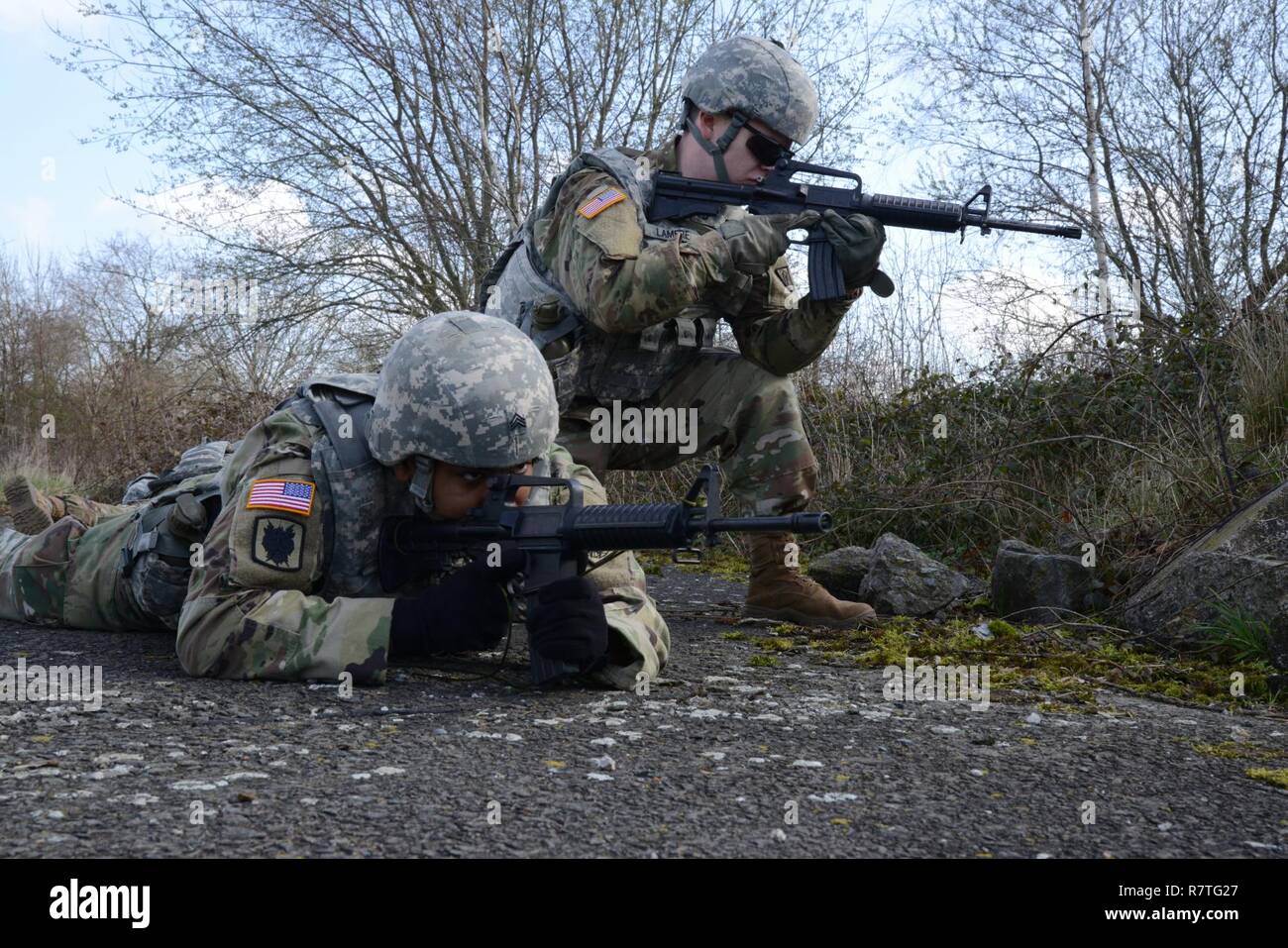 U.S. Army Sgt. Joel Delerosa and Pfc.Trevor Lamere , both assigned to ...