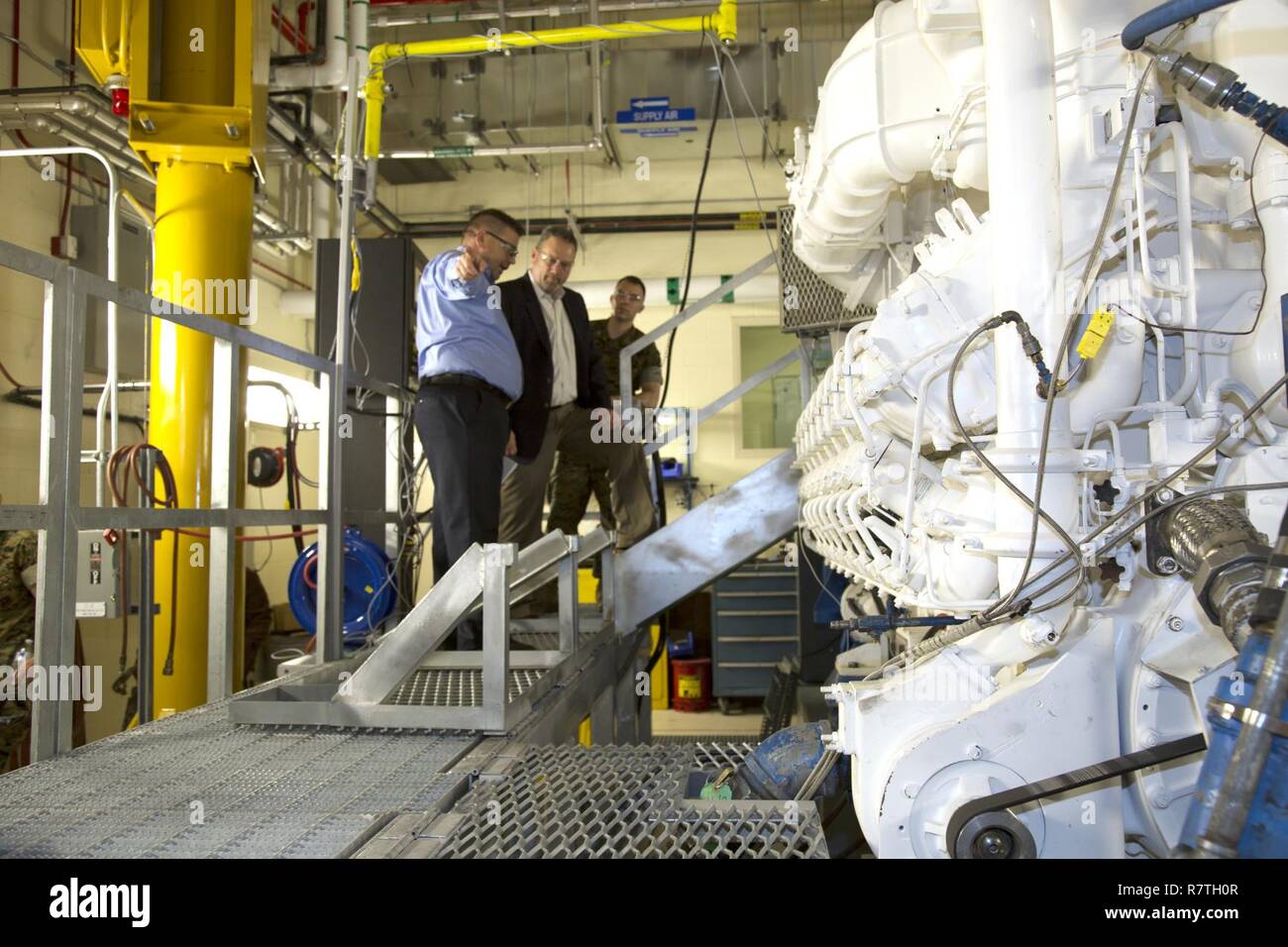 (Left) William Beckley, production trades manager, explains how the ...