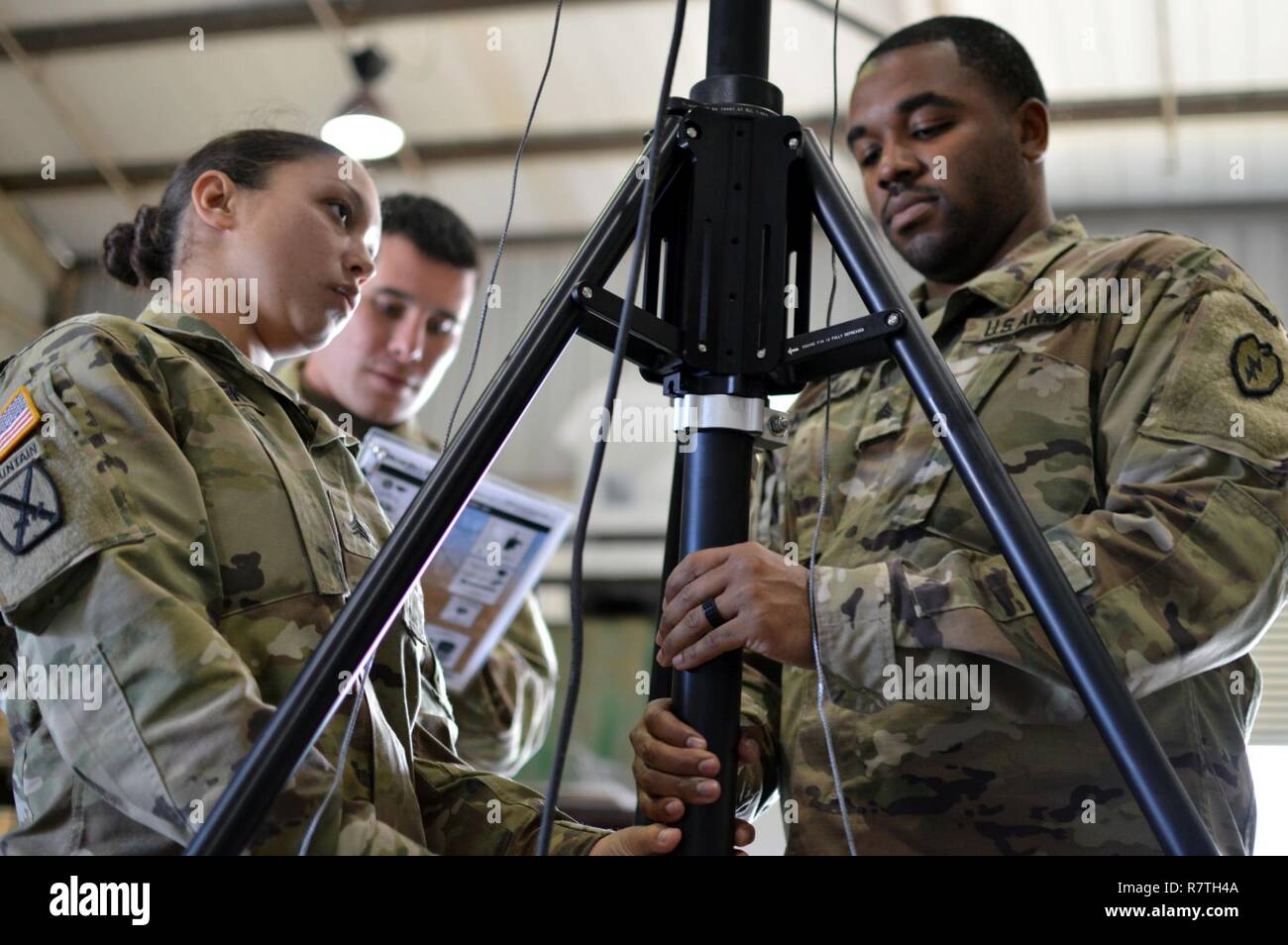 Sgt. Shereena Martinek (left) and Sgt. Marcel Nicholas assemble the ...