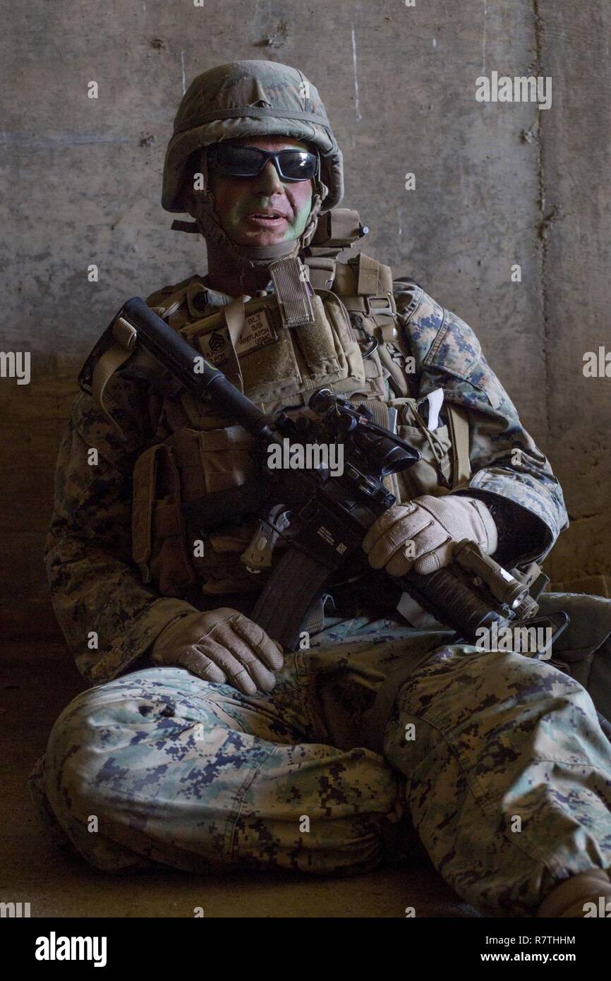 U.S. Marine Corps Staff Sgt. Bryan Whitlatch, infantry unit leader ...