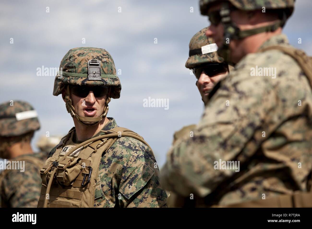 U.S. Marine Corps Capt. Adam S. Young, left, company commander of India ...