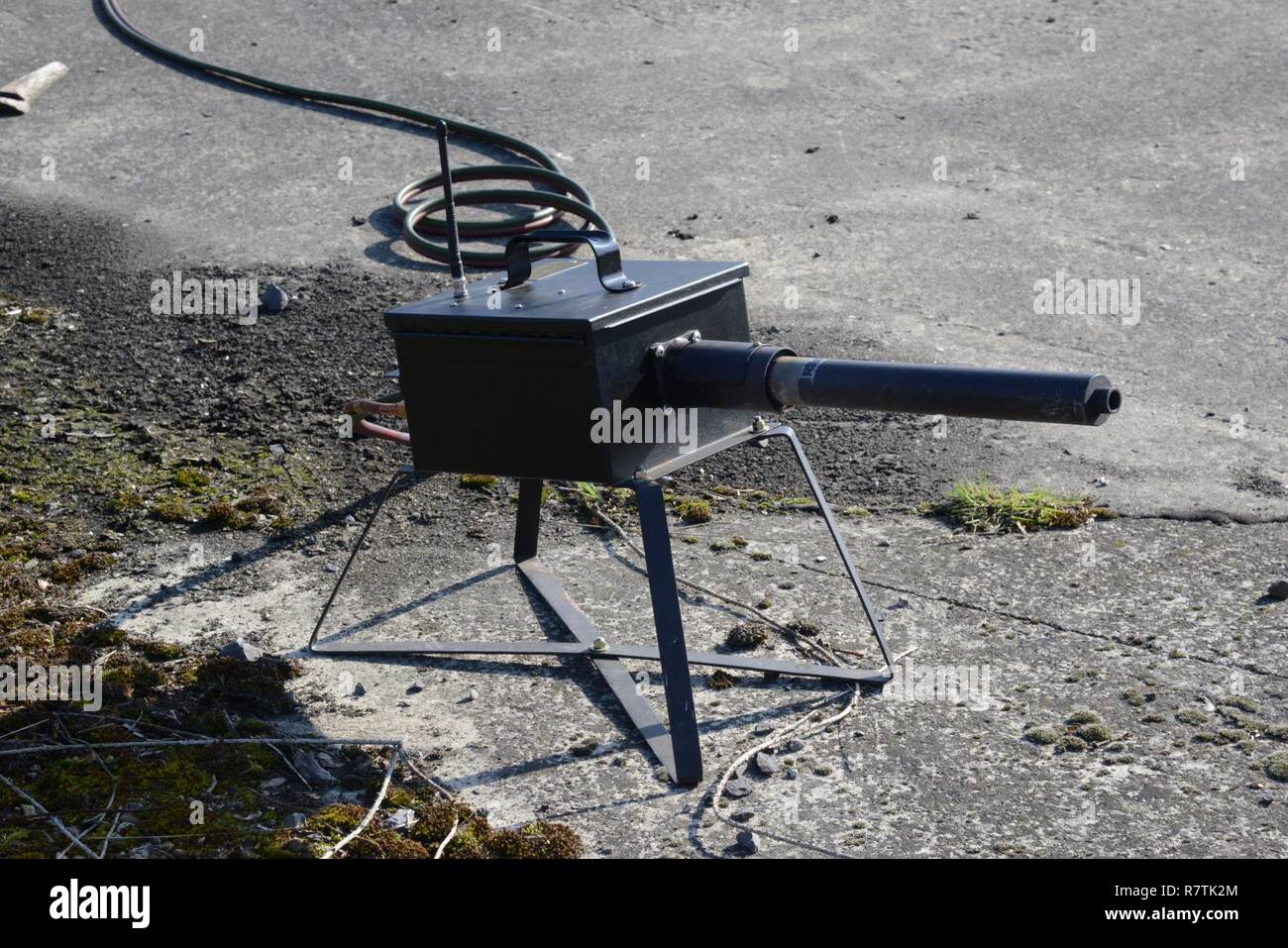 Close view of a fire gun simulator triggered via remote control, used ...