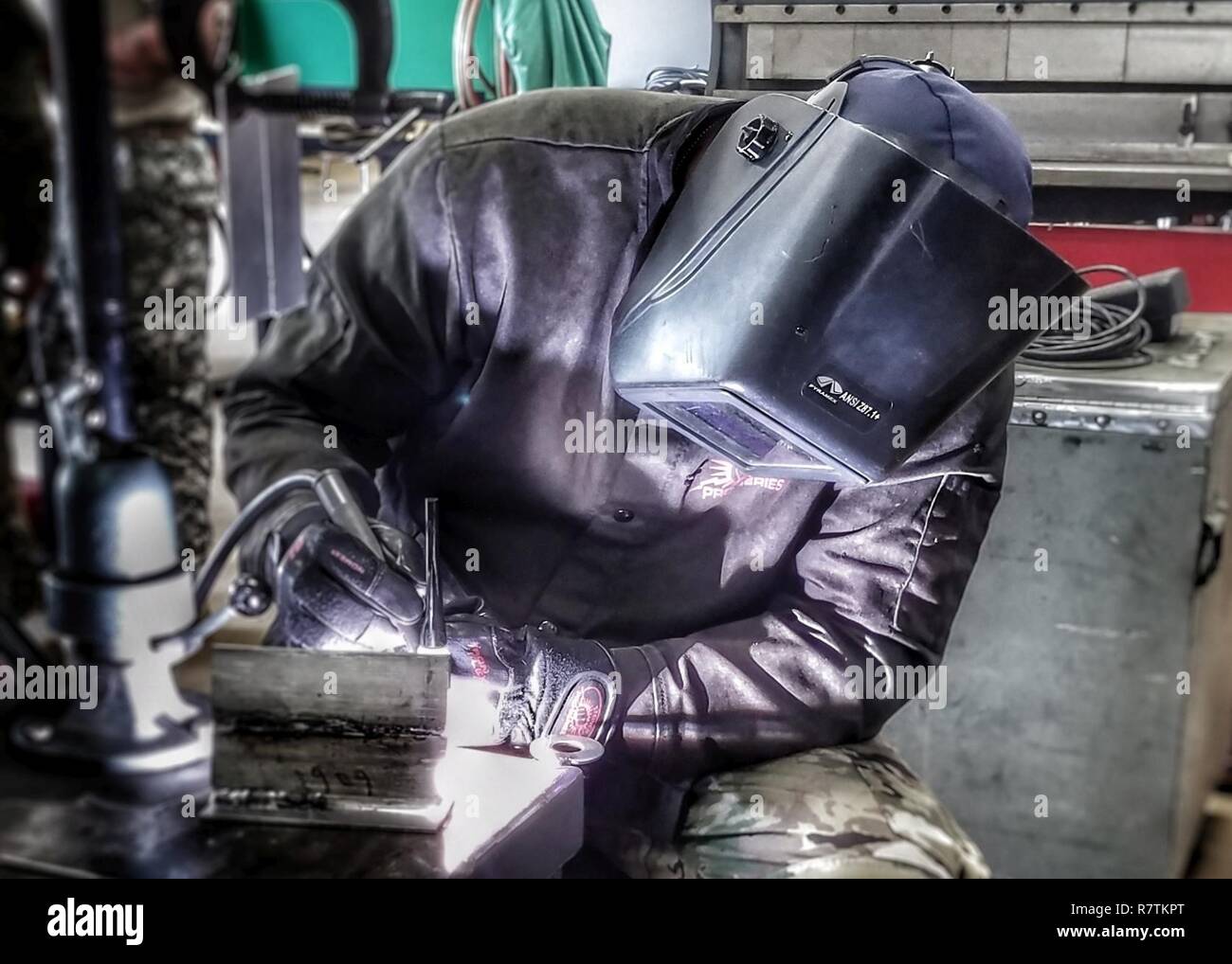 A National Guard Soldier practices safe welding techniques at the ...