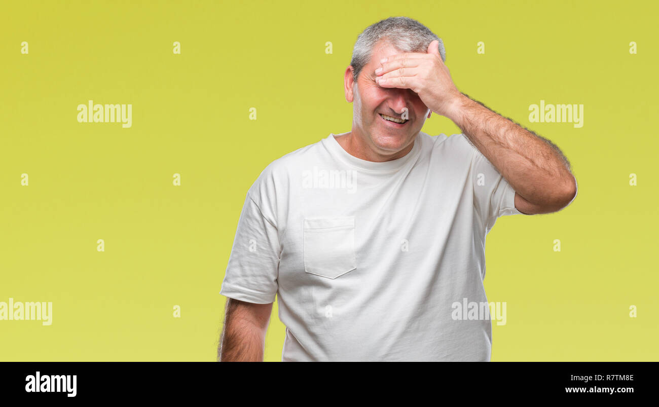 Handsome senior man over isolated background smiling and laughing with ...