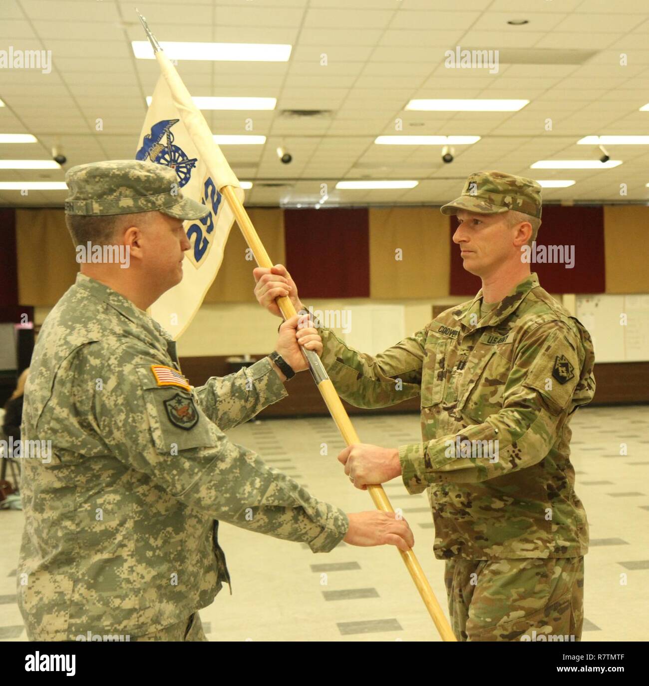 Capt. Samuel Coover, 252nd Quartermaster Company commander, receives ...