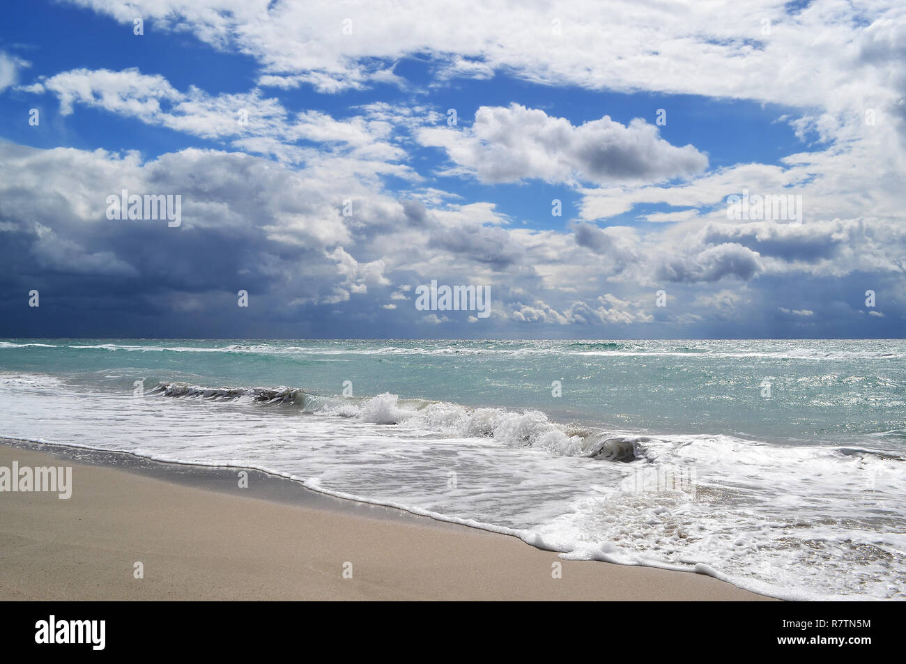 Calm before the storm on the Black Sea, empty sand beach in sunny day ...