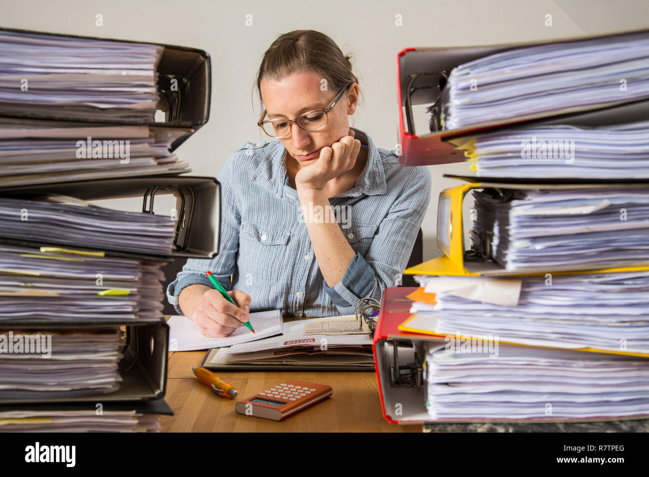 Working at a desk hi-res stock photography and images - Alamy