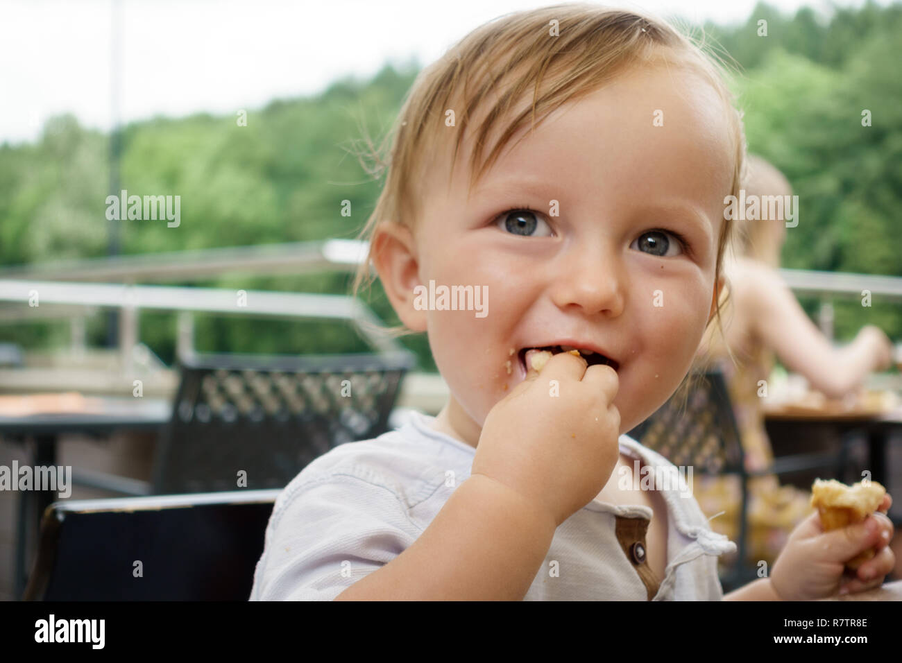 Boy eating food Stock Photo - Alamy