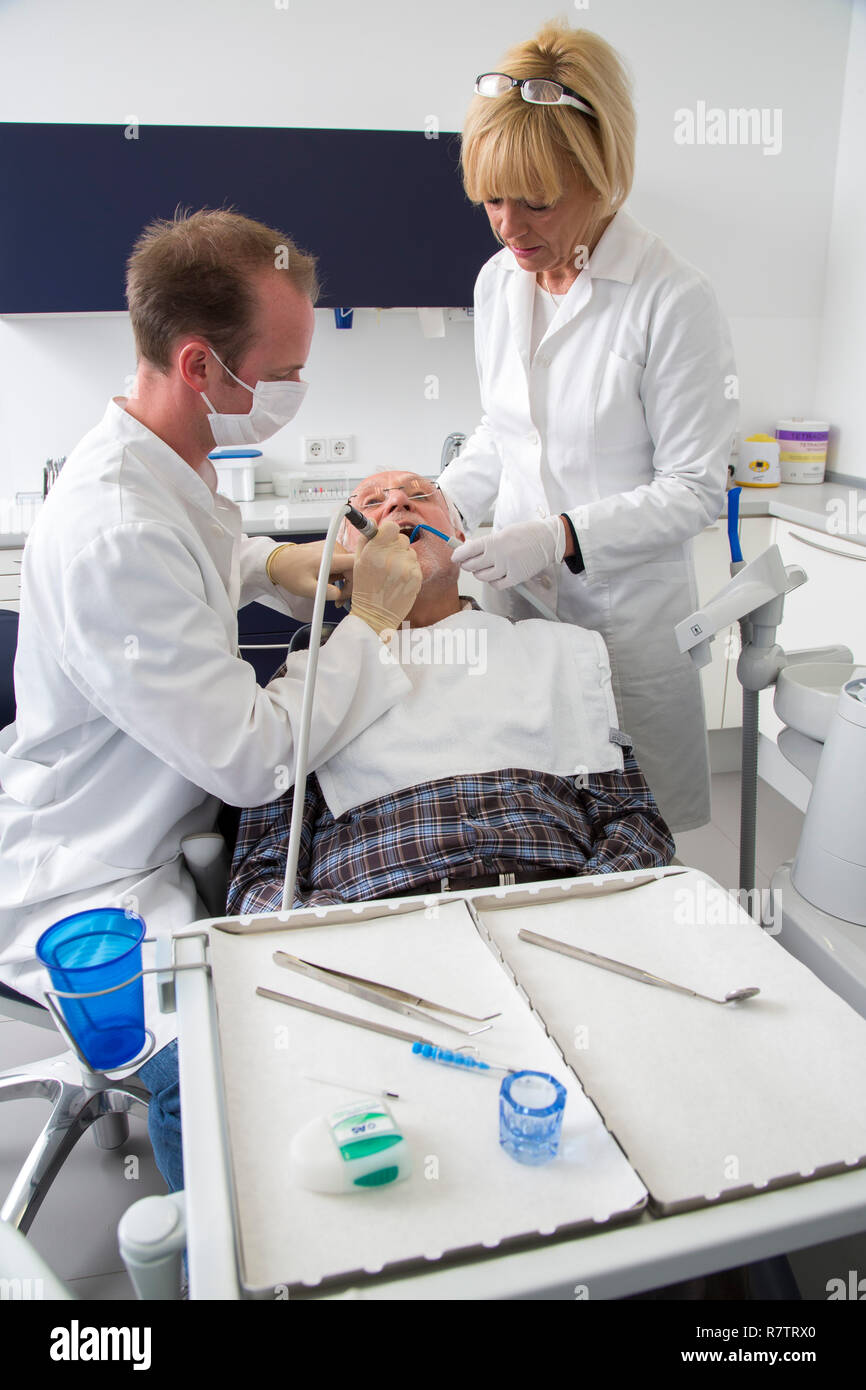 Receiving medical treatment hi-res stock photography and images - Alamy
