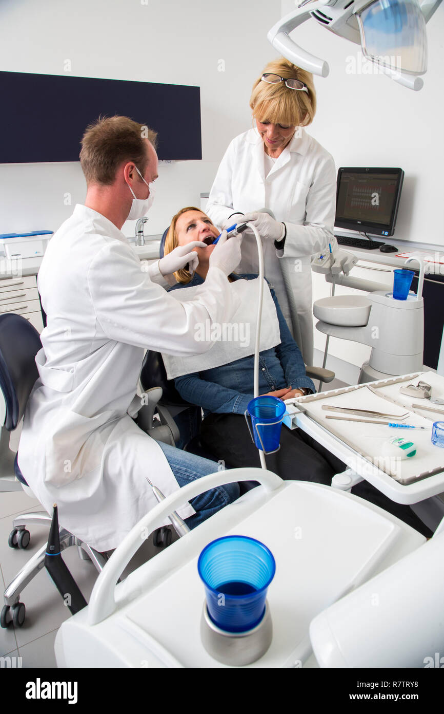 Receiving medical treatment hi-res stock photography and images - Alamy