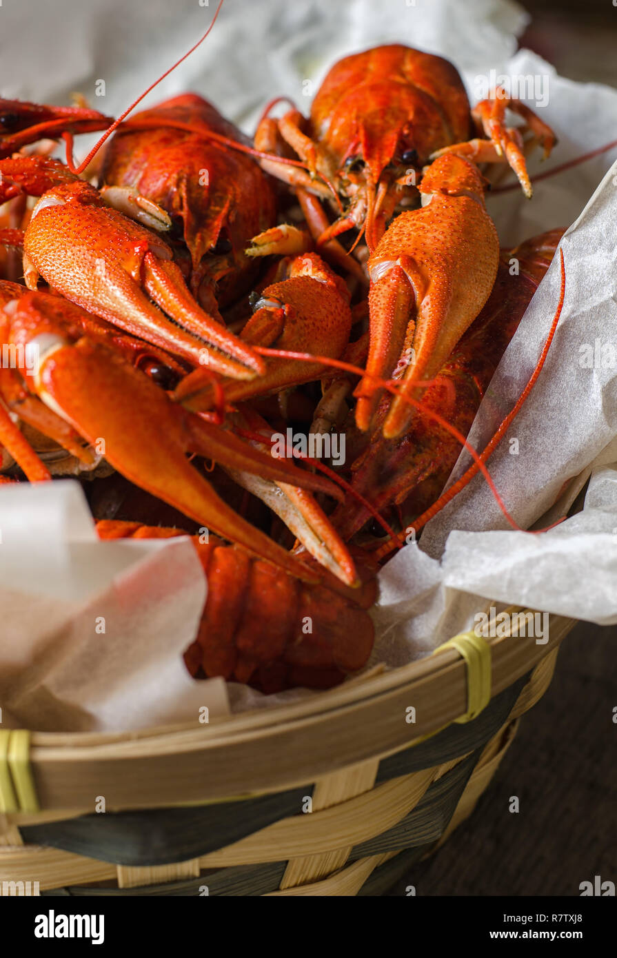 Boiled crawfish with dill in wooden dish Stock Photo - Alamy