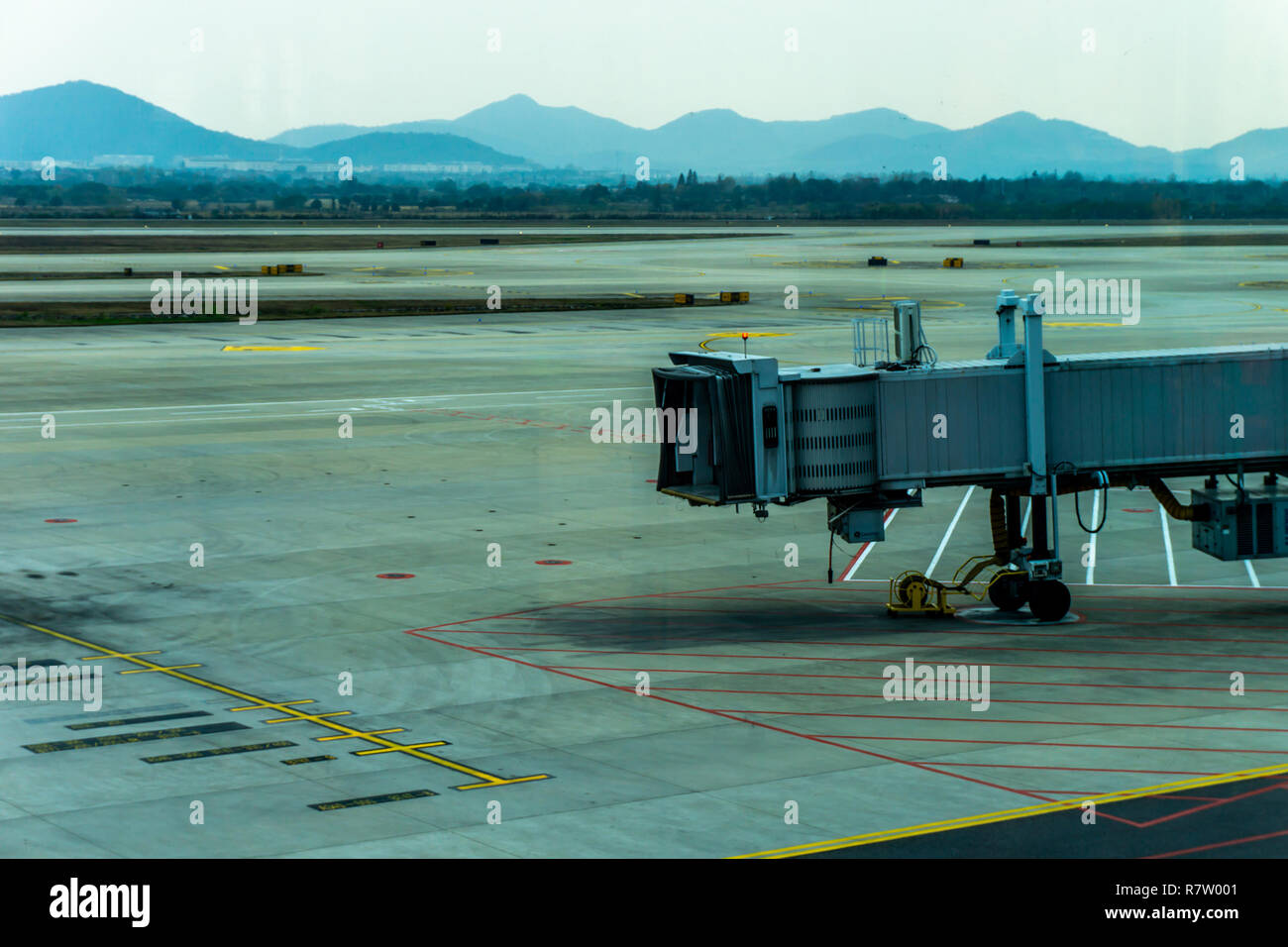 Lonely Airport Apron Drive Airbridge Without Airplane Stock Photo - Alamy