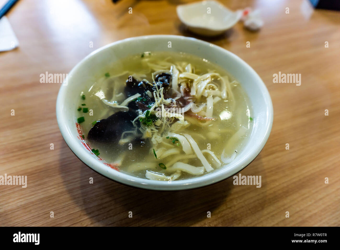 Traditional Tasty Chinese Dazhu Gansi in a White Bowl Stock Photo - Alamy