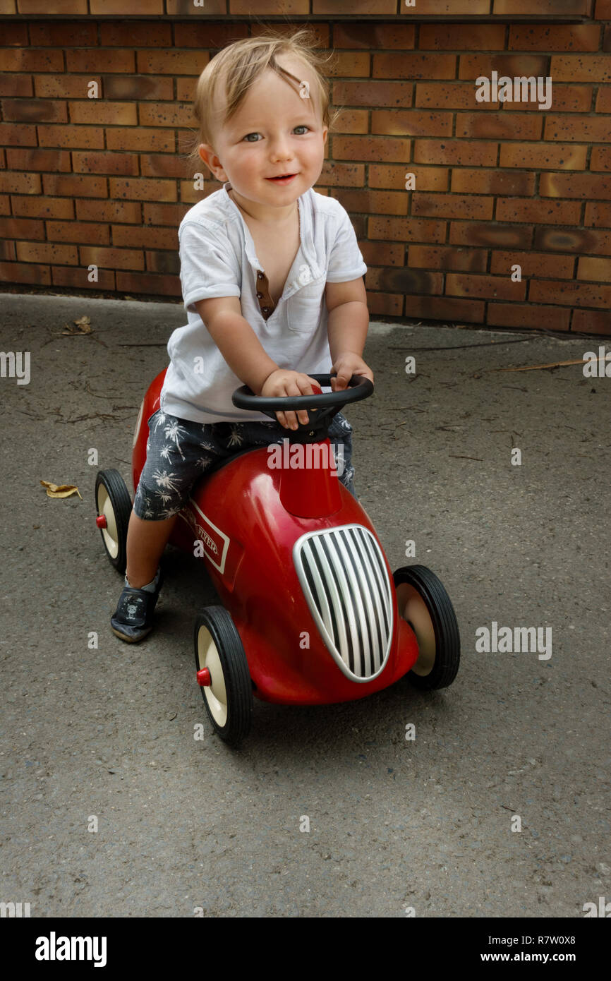 Boy driving toy car hi-res stock photography and images - Alamy