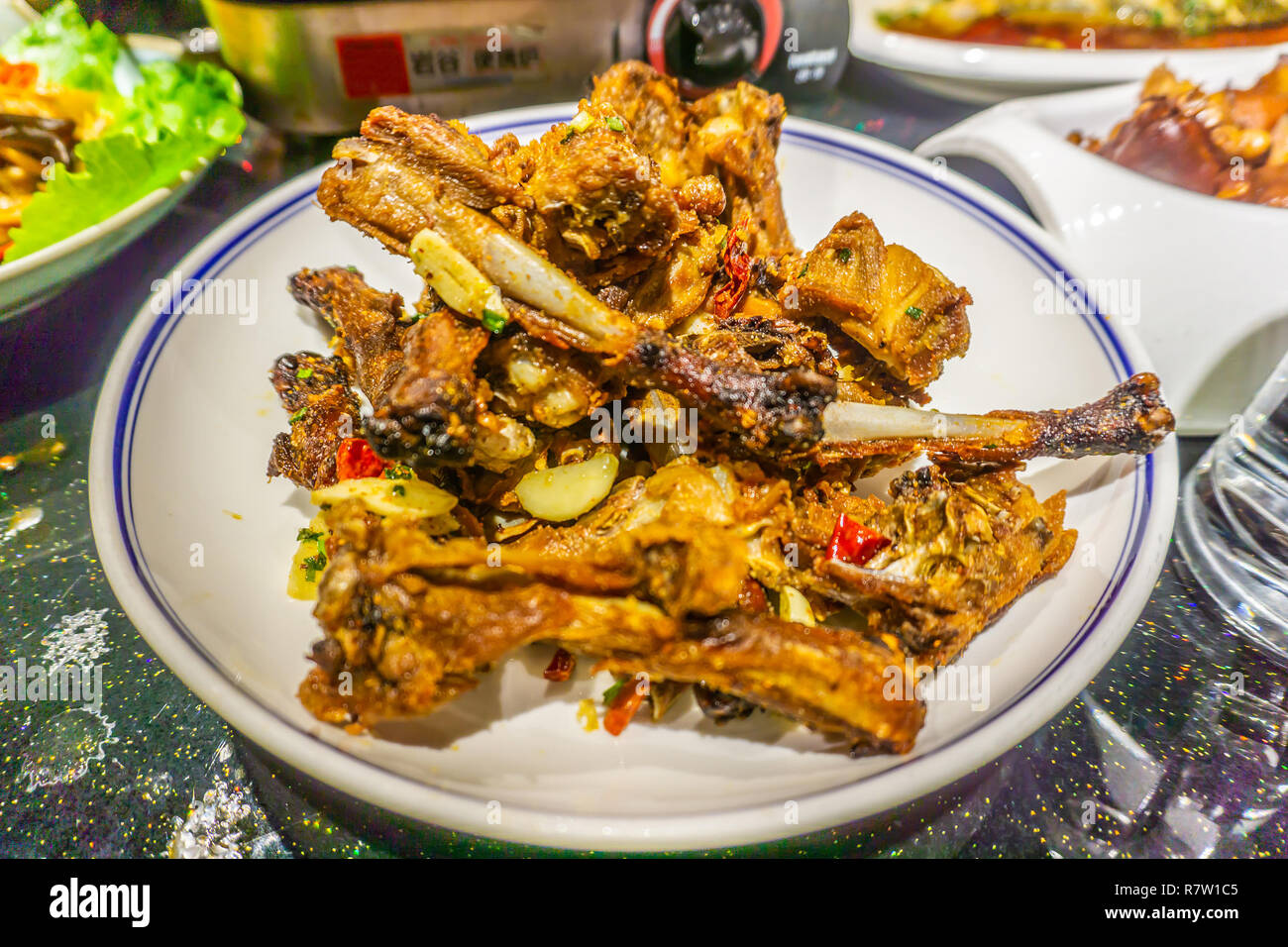 Chinese Pepper Salt Deep Fried Duck with Bones on a White Plate Stock Photo - Alamy