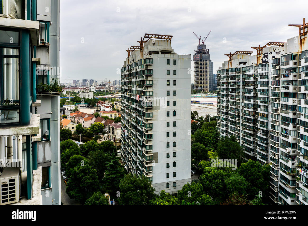 Shanghai Multi Level Highrise Apartment Building with Cloudy Rainy Sky ...