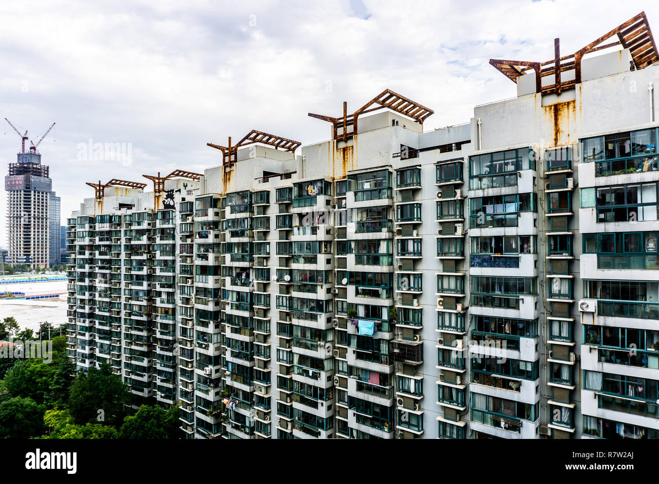 Shanghai Multi Level Highrise Apartment Building with Cloudy Rainy Sky ...