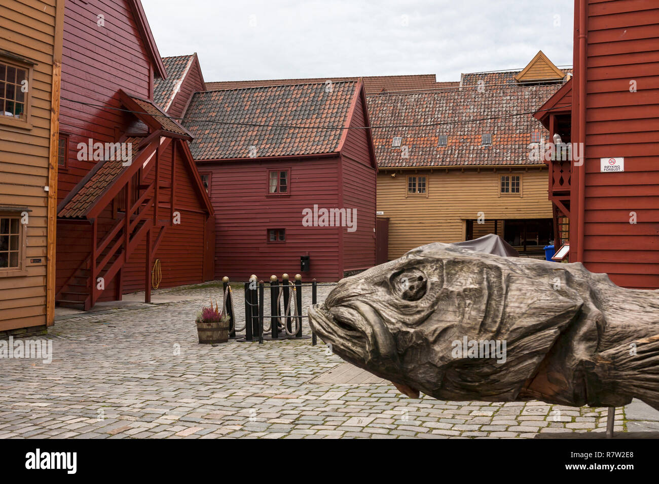 Large carved wooden sea monster, or stockfish, Bryggestredet, Bryggen ...
