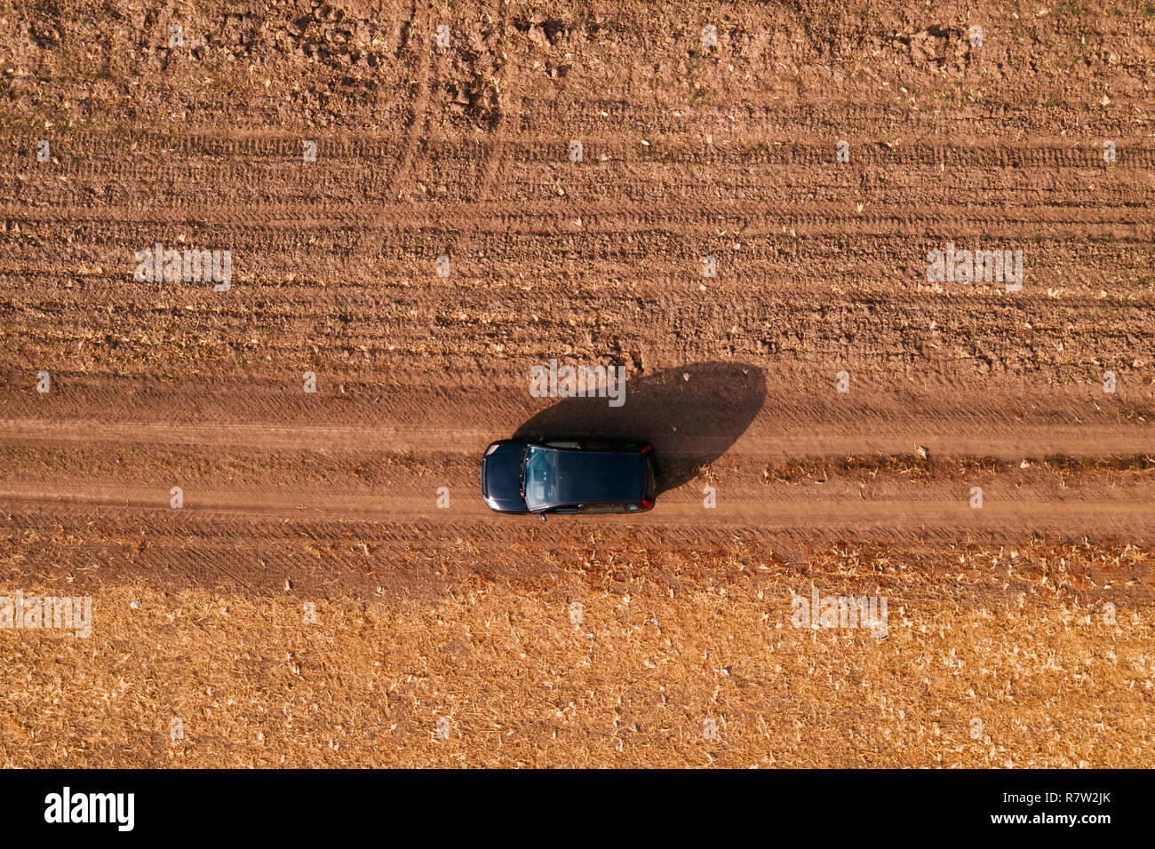 Driving car on dusty road hi-res stock photography and images - Alamy