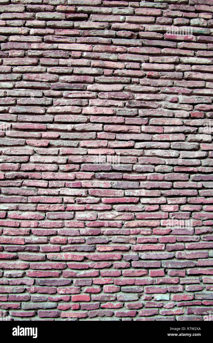 Small red brick wall of red color in Jallianwala bagh Stock Photo - Alamy