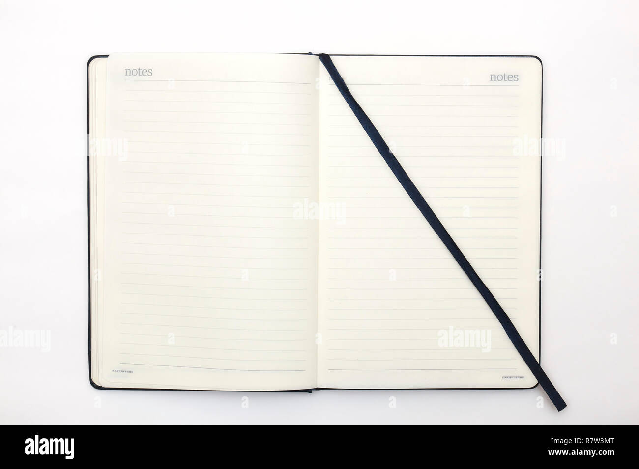 Notebook and pencil on white background. Abstract background for ...