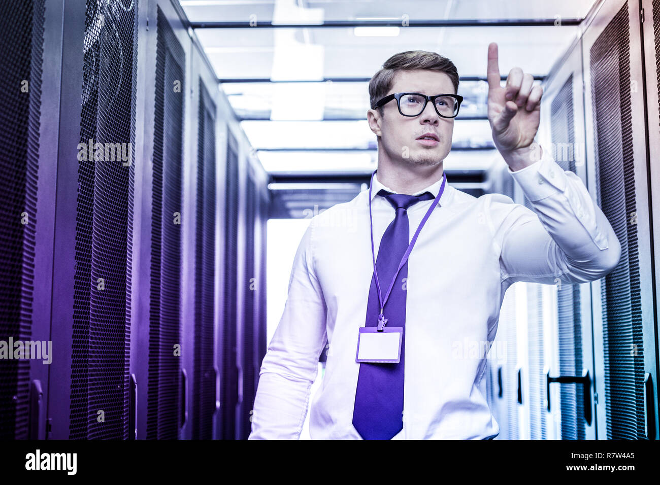 Smart intelligent man focusing on his work Stock Photo - Alamy