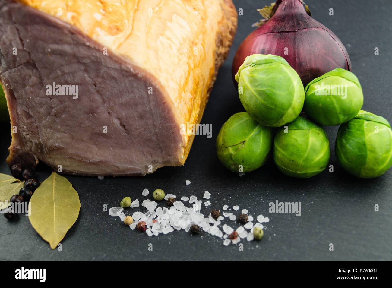 traditional german Food smoked pork with brussels sprouts Stock Photo ...