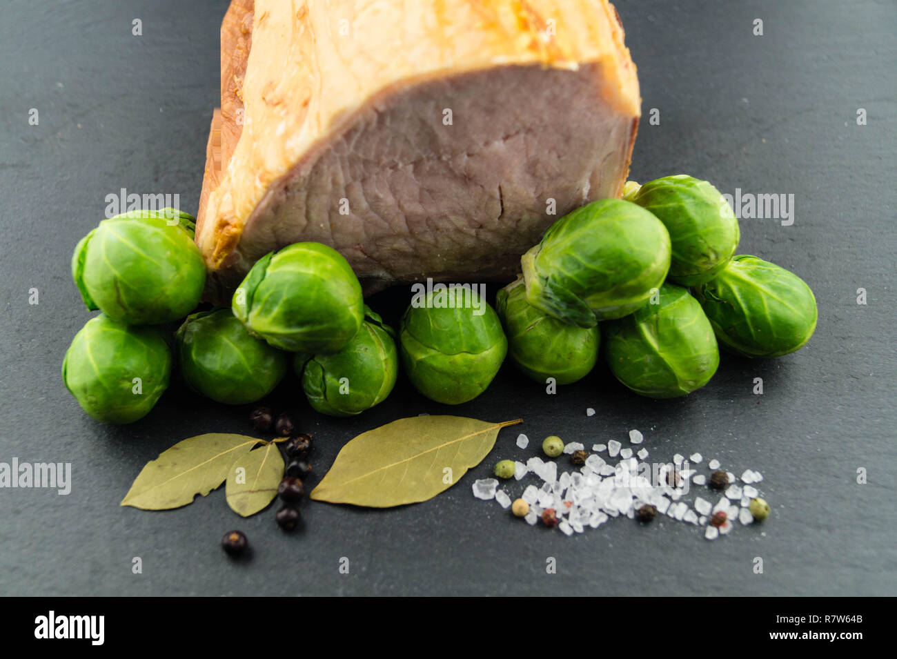 traditional german Food smoked pork with brussels sprouts Stock Photo ...