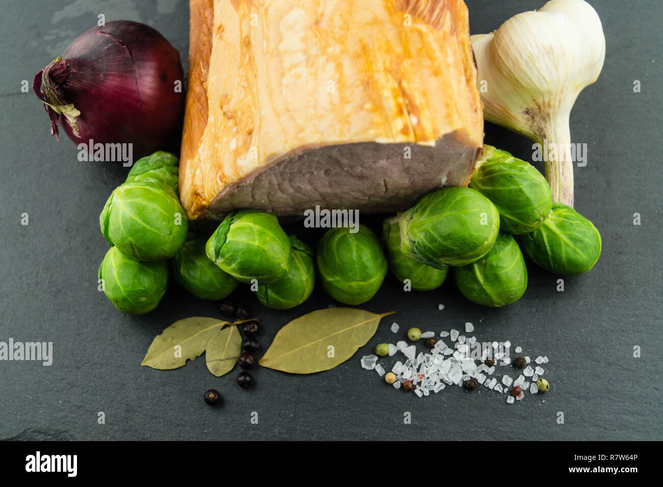 traditional german Food smoked pork with brussels sprouts Stock Photo ...