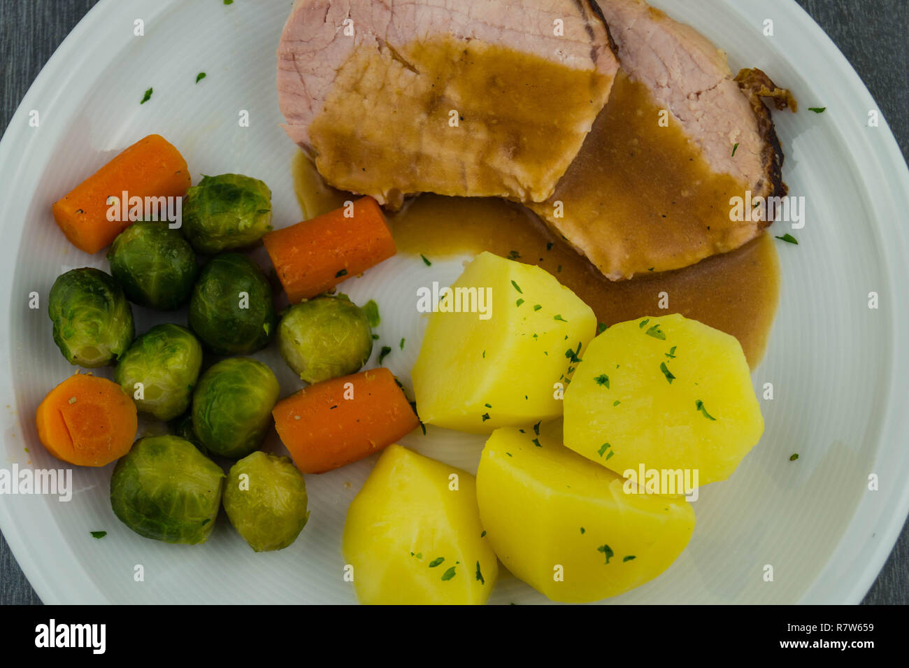 traditional german Food smoked pork with brussels sprouts Stock Photo ...