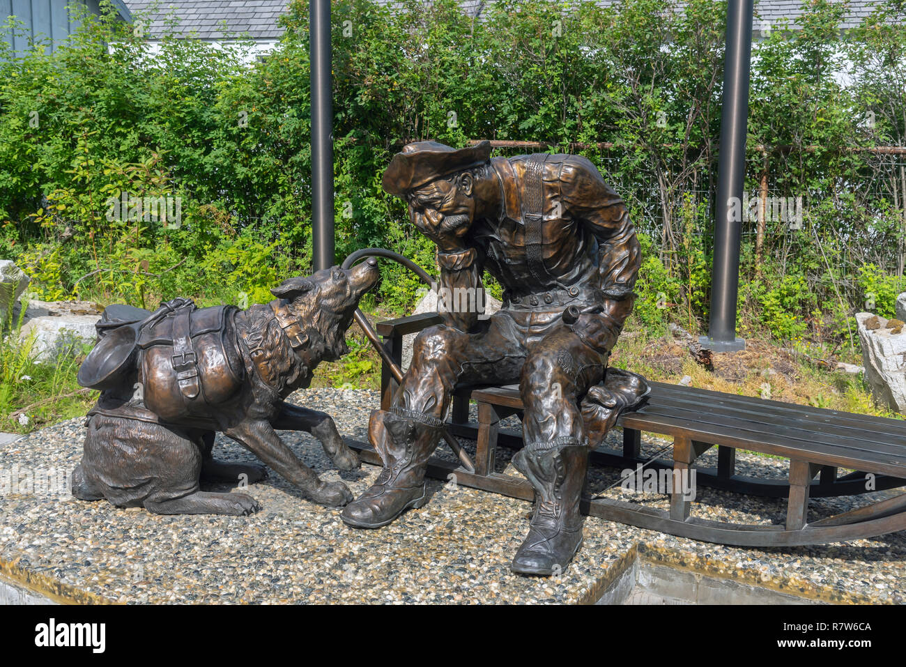 A sculpture of a prospector and his dog near the Alaska Geographic ...