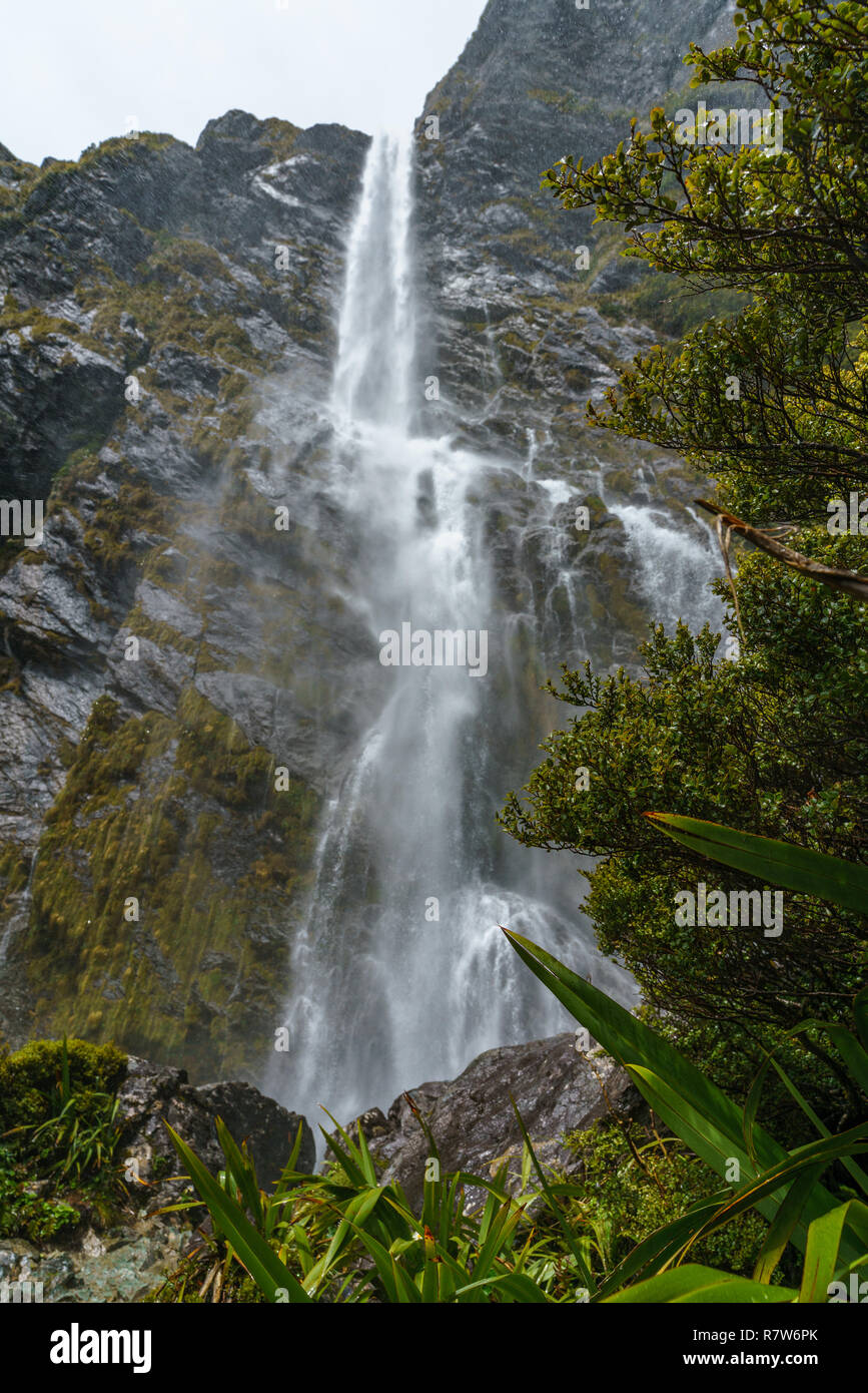 mighty waterfalls in the mountains, earland falls, southland, new ...