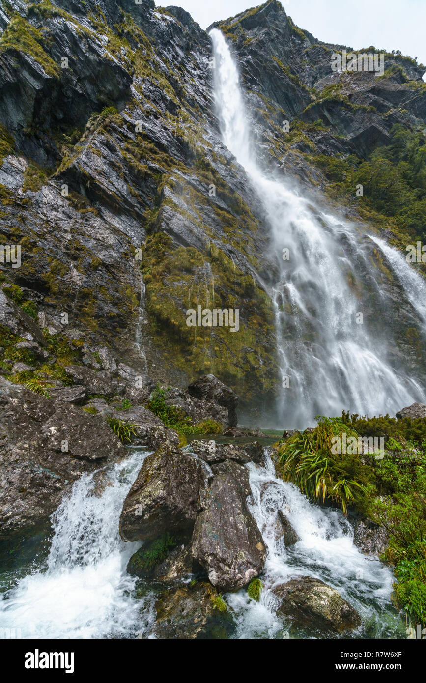 mighty waterfalls in the mountains, earland falls, southland, new ...