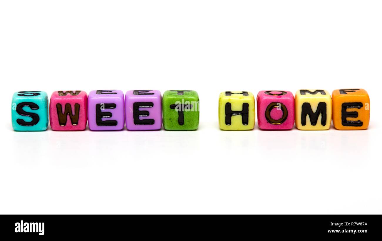 sweet home - word made from multicolored child toy cubes with letters ...