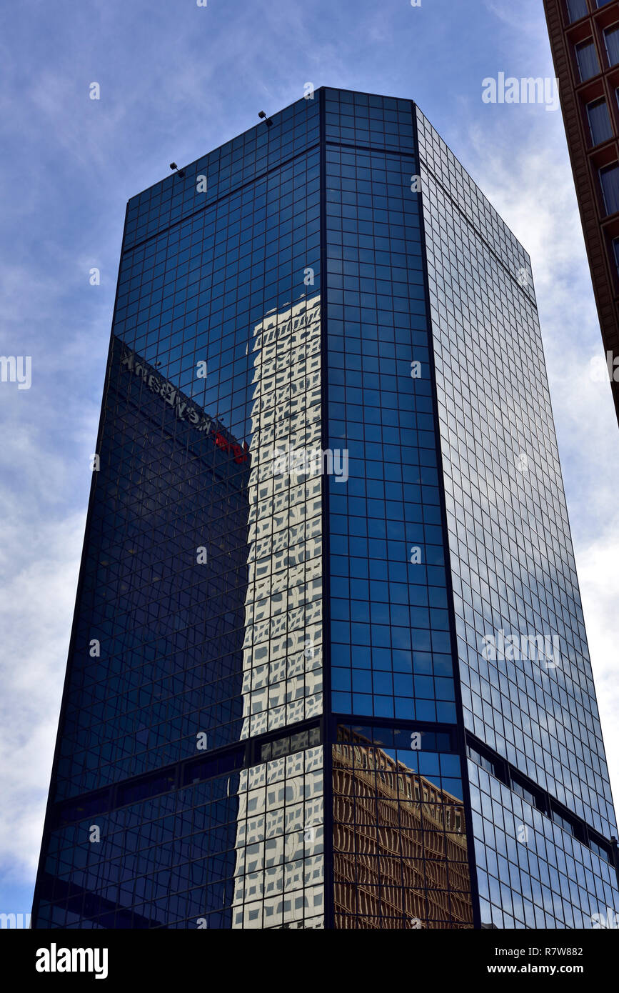 Office tower block with reflection of adjacent office block in its ...