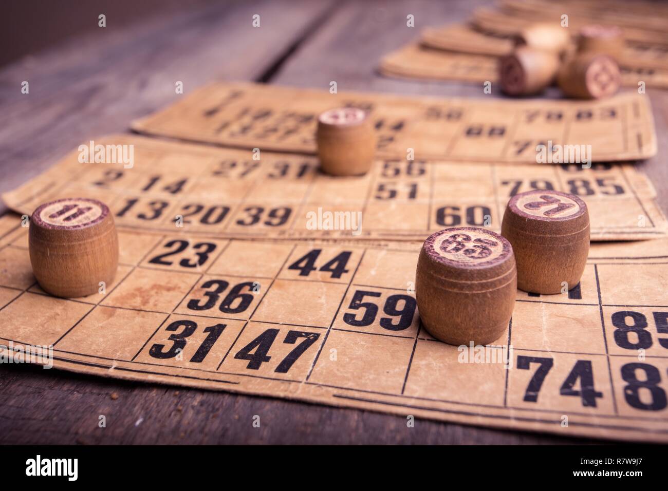 old wooden lotto barrels and game cards Stock Photo - Alamy