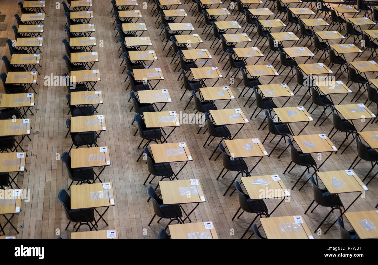 Examination hall set up with plastic chairs and wooden desks Stock ...