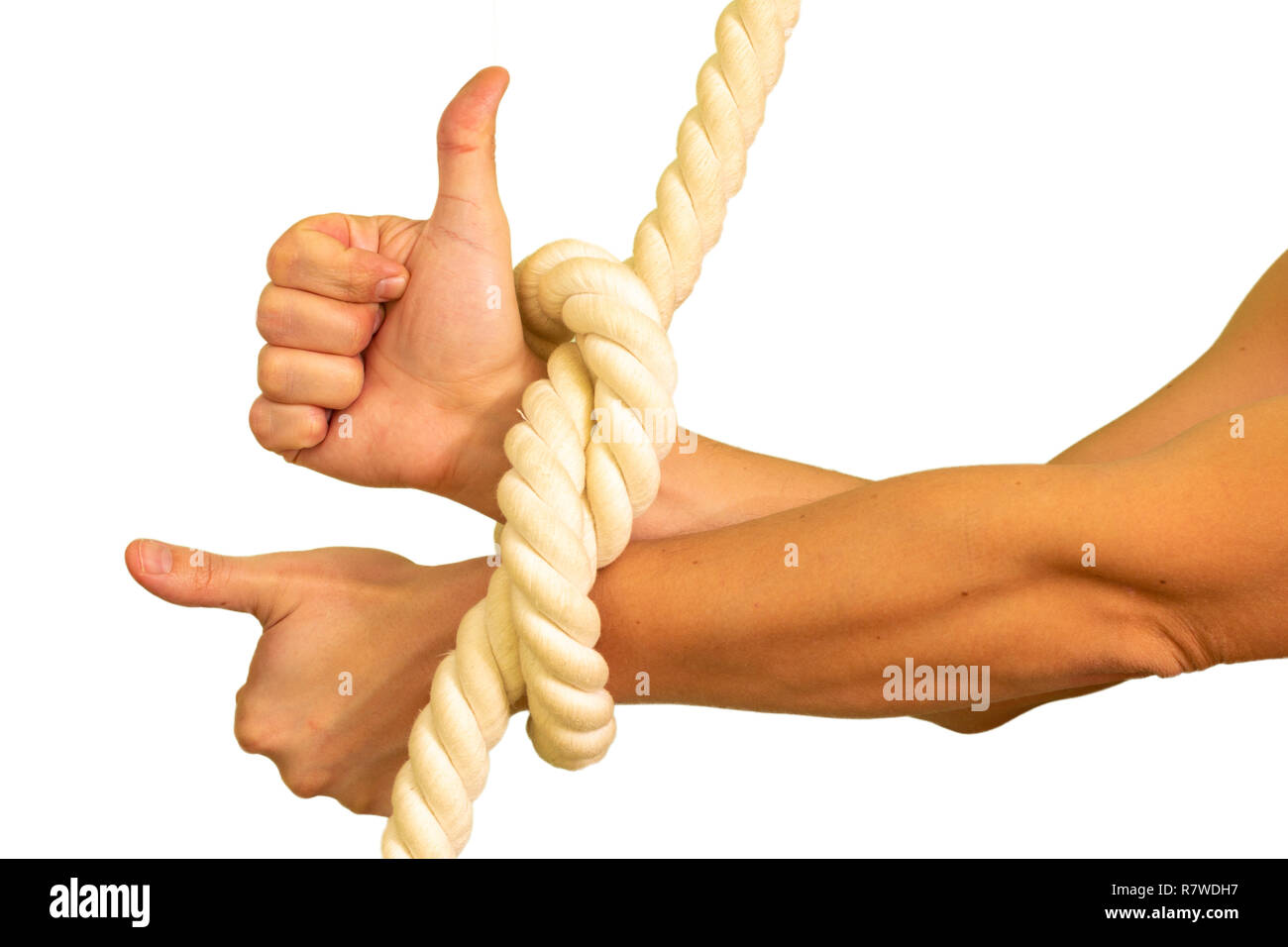 The male hands are tied to the ropes and show the thumb up, like ...