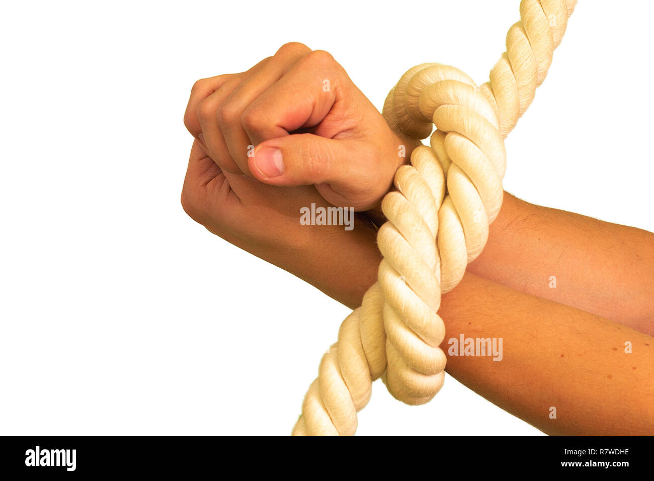 Men's hands are tied in ropes and clenched in their fists. Isolated on ...