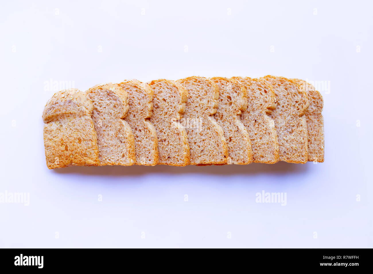 Whole wheat bread isolated on white background Stock Photo - Alamy
