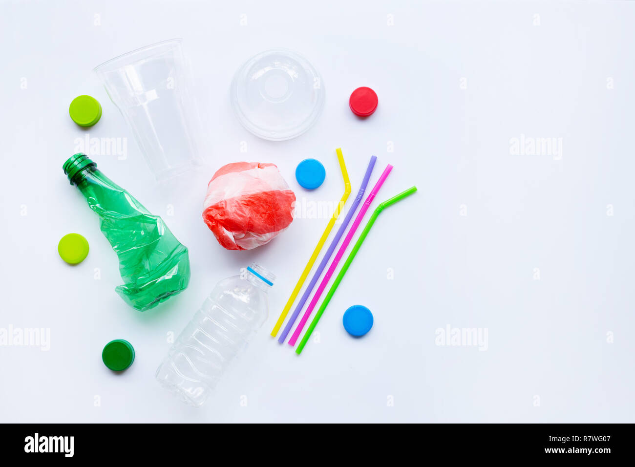 Plastic waste on white background. Top view Stock Photo - Alamy