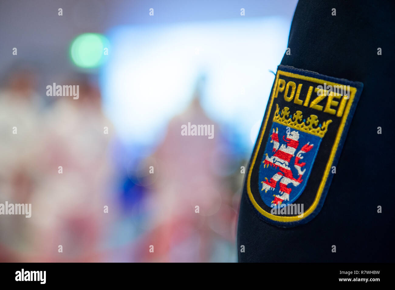 07 December 2018, Hessen, Gießen: The coat of arms of the police Hessen ...