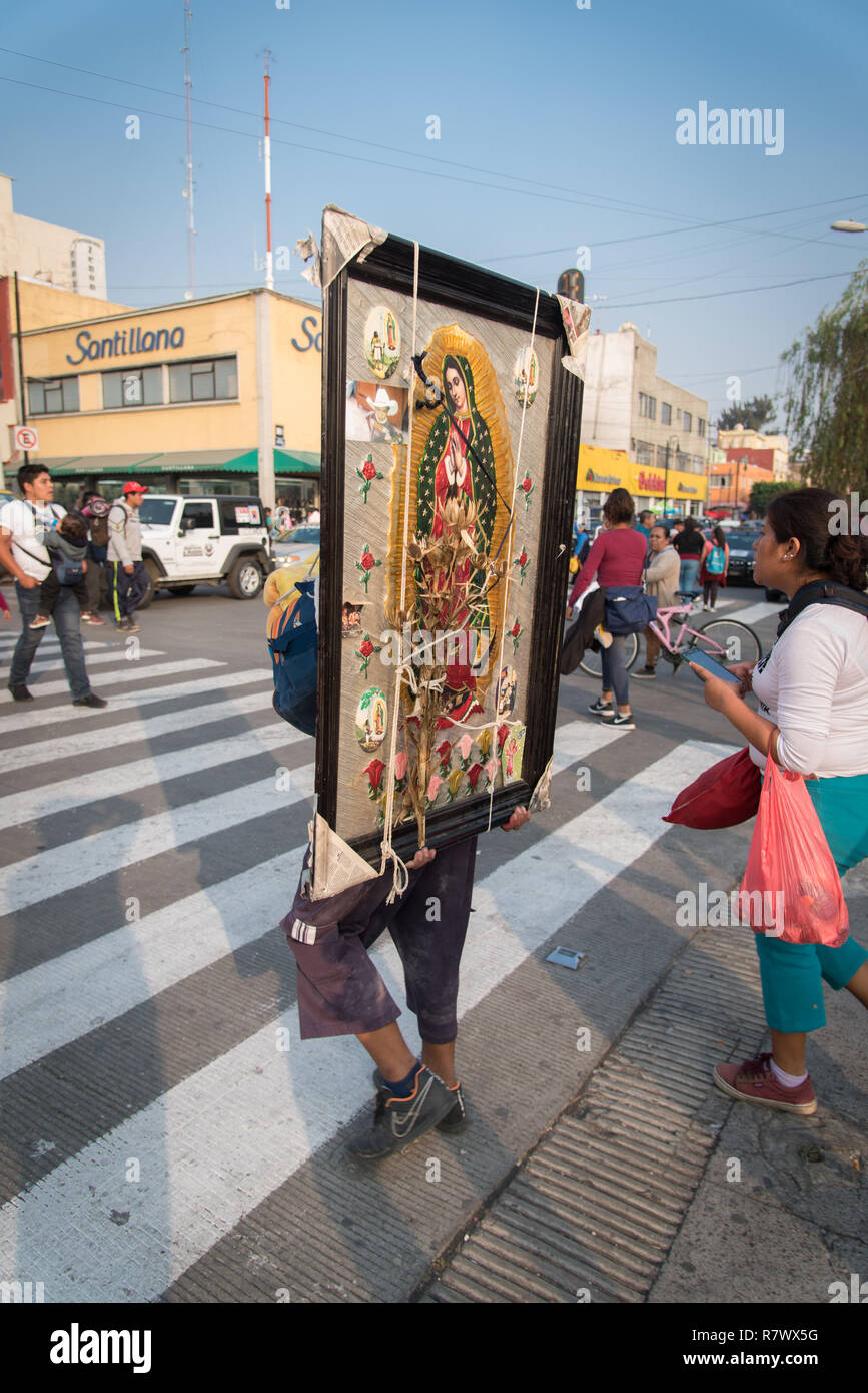 Mexico City, Mexico. 11th Dec 2018. A pilgrim carrying an image of Our ...