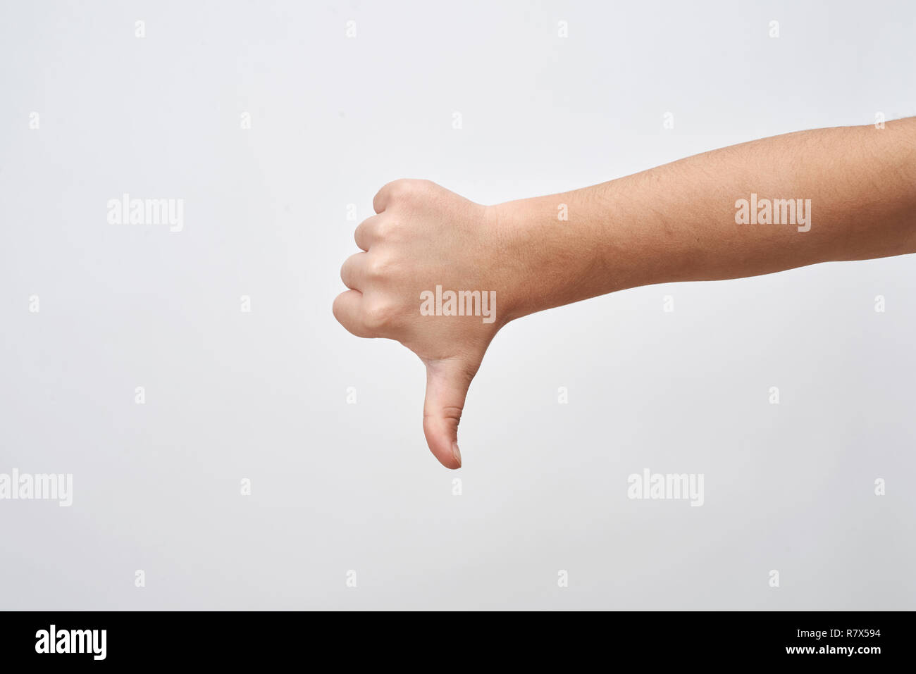 Child hand shows thump down.Negative sign of disagreement and unlike ...