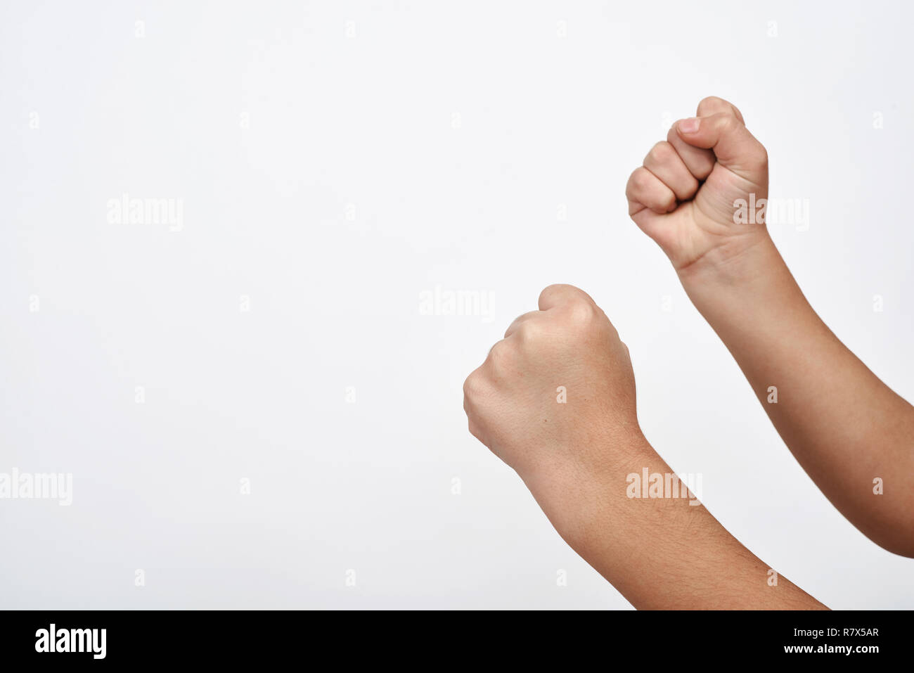 Kid hands ready to punch.Child aggression Stock Photo - Alamy
