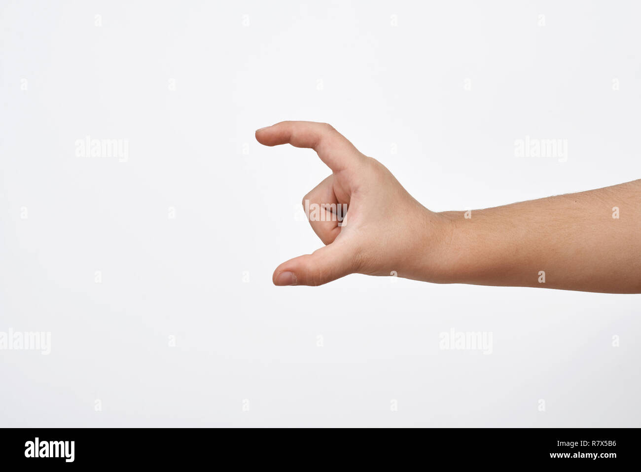 Child hand shows the big size sign Stock Photo - Alamy