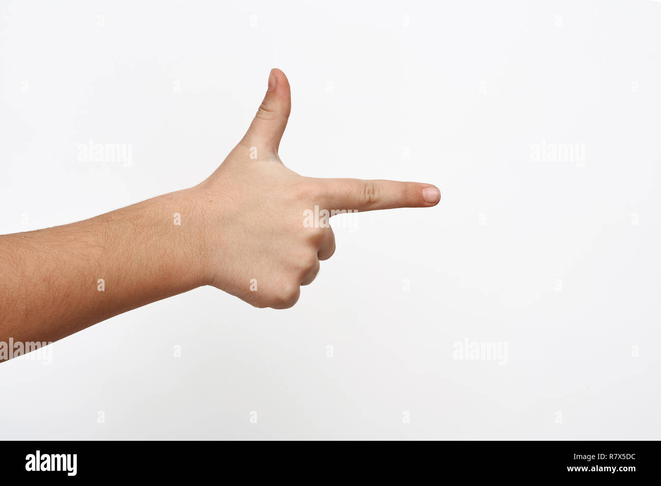 Child hand shows two fingers making gun sign Stock Photo - Alamy