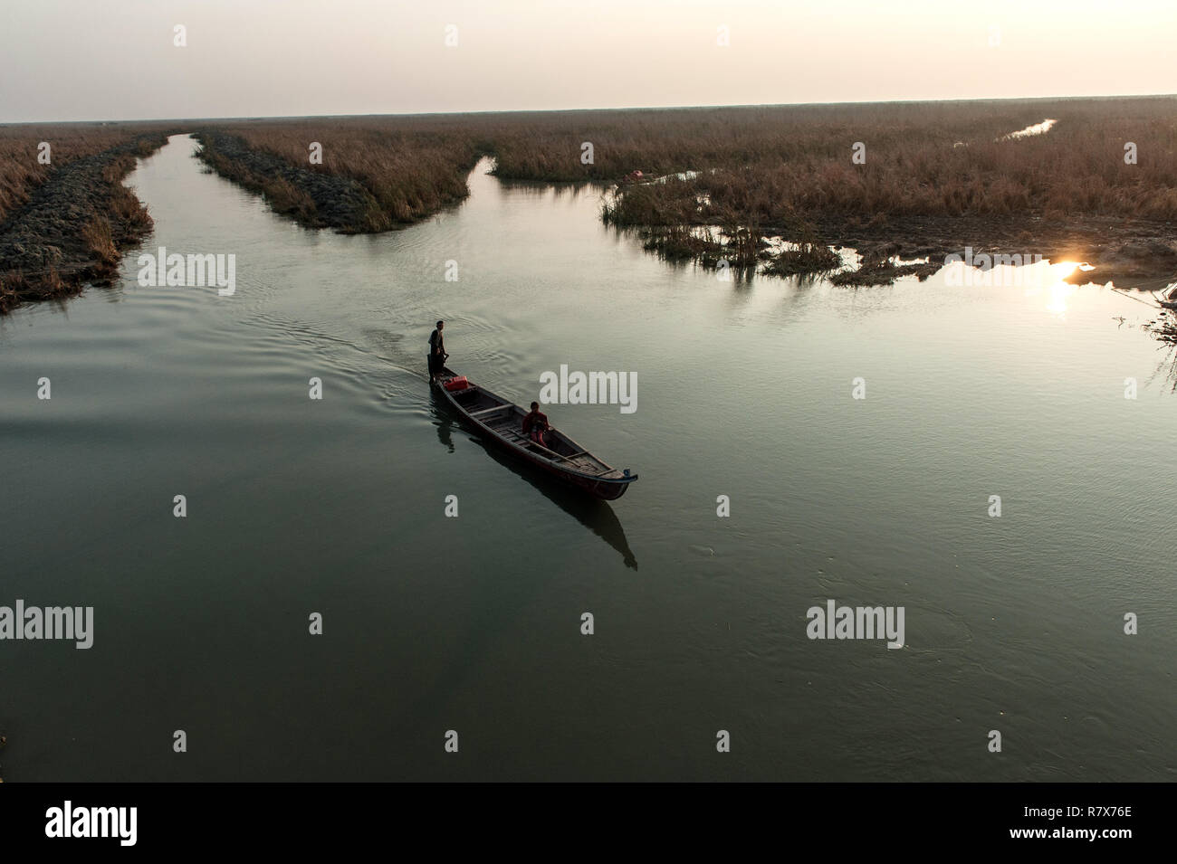 Marsh Arab boatmen seen in the Hamar Marsh of the Southern wetlands of ...